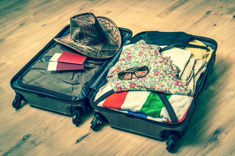 Open Suitcase Packed for Travelling - Retro Style Stock Image - Image ...