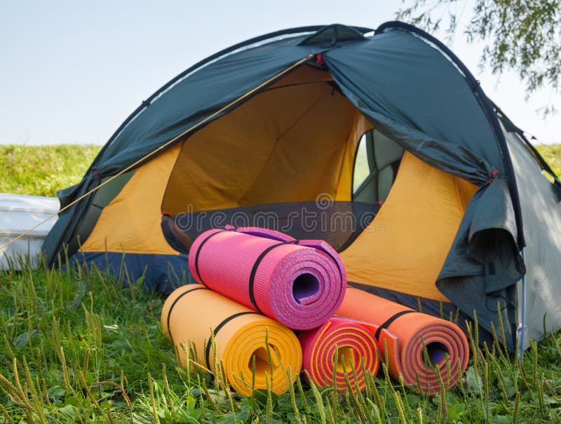 Open Tent and Rolled Sleeping Pads Stock Image - Image of bonfire ...