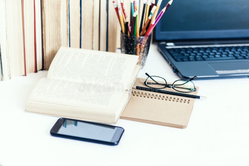Open Textbook, Notebook, Smartphone, Laptop Computer, Stack of Books ...