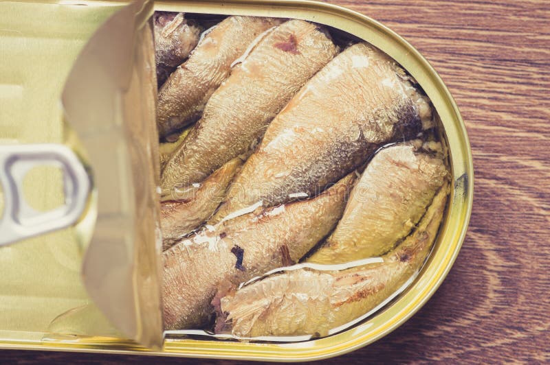 Open tin can with fish stock photo. Image of product - 59703946