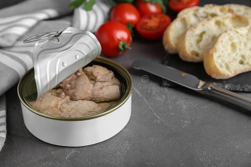 Open Tin Can of Tasty Cod Liver on Grey Table, Closeup. Space for Text ...
