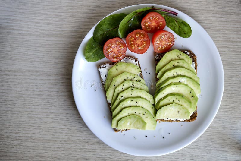 Open toasts with avocado stock image. Image of snack - 143080621