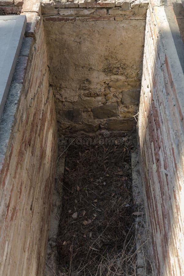 Open tomb in a cemetery stock image. Image of brick, religion - 40670843