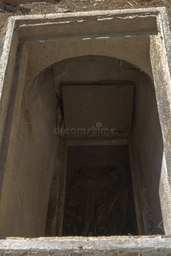 Open tomb in a cemetery stock photo. Image of burial - 40670606