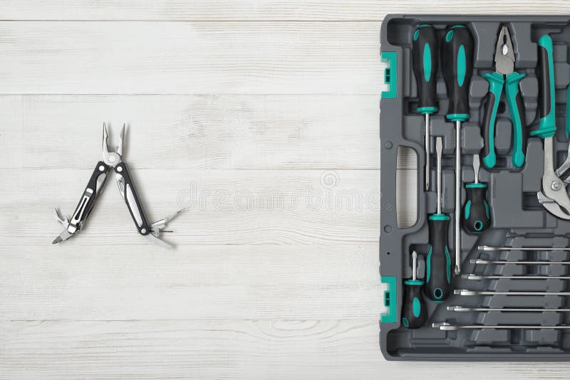 Open Toolbox and Multi Tool on Wooden Surface Stock Image - Image of ...