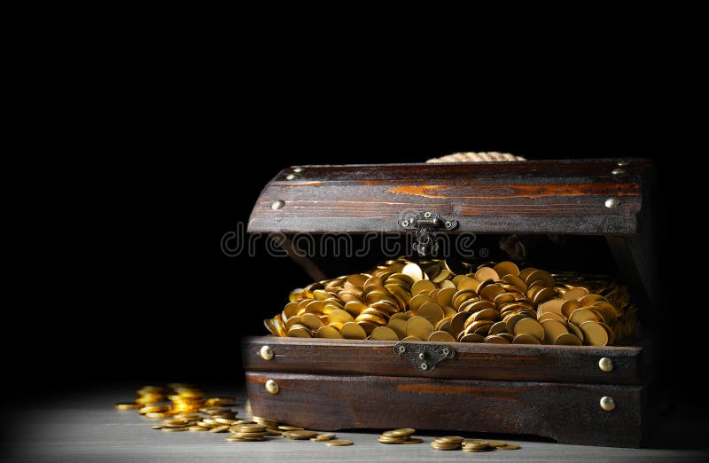 Open Treasure Chest with Gold Coins on Grey Wooden Table Stock Photo ...
