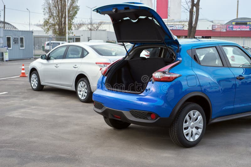 Open the Trunk of a Blue Car Stock Photo - Image of reflection ...