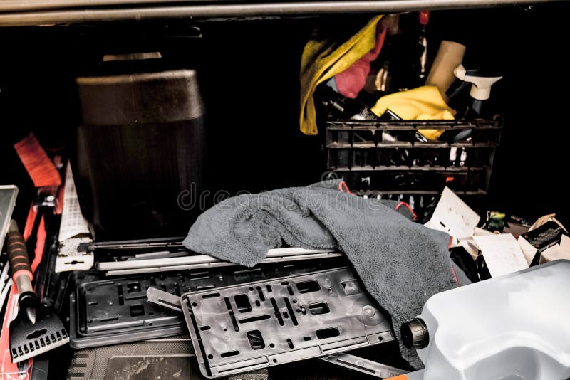 Open Trunk of a Car in Which a Mess.Tools and Debris in the Trunk Stock ...