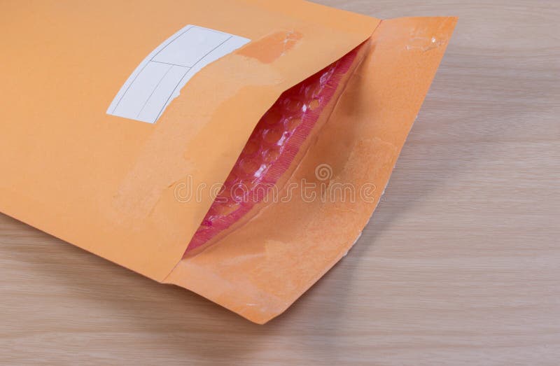 Used Yellow Blank Envelope with Transparent Bubble Wrap or Packaging ...