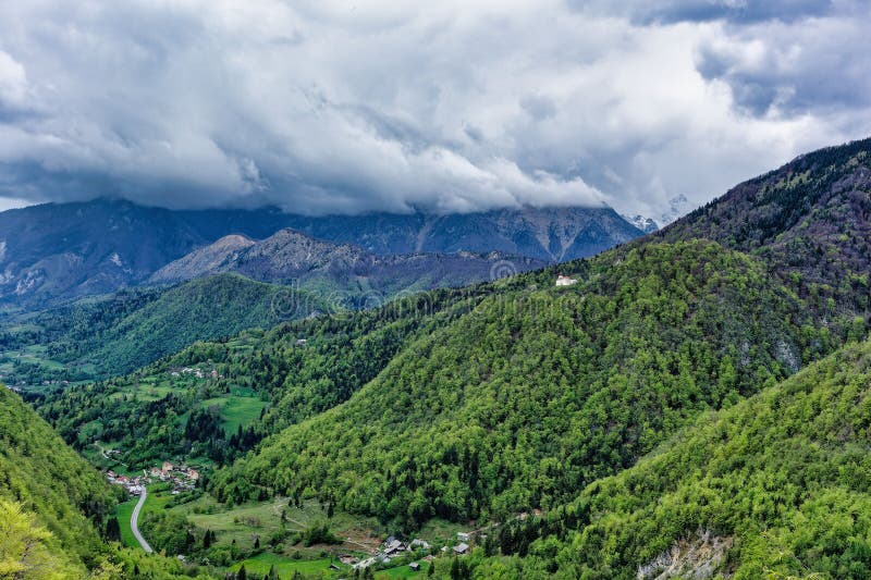 An Open Valley on the Other Side of a Green Forest Stock Image - Image ...
