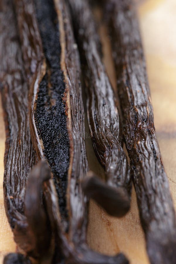 Vanilla Pod on Olive Board with Beans on Knife Stock Image - Image of ...