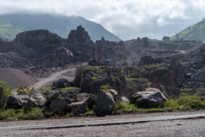 Open volcanic rock mine stock photo. Image of equipment - 236617452