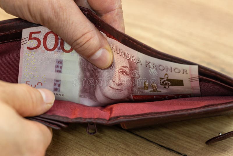 An Open Wallet in Your Hand with a Banknote of 500 Swedish Kroner Stock ...