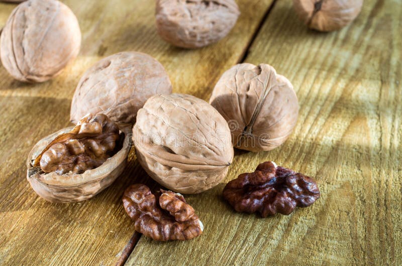Open Walnut, Grain of Walnut, on a Wooden Table Stock Image - Image of ...