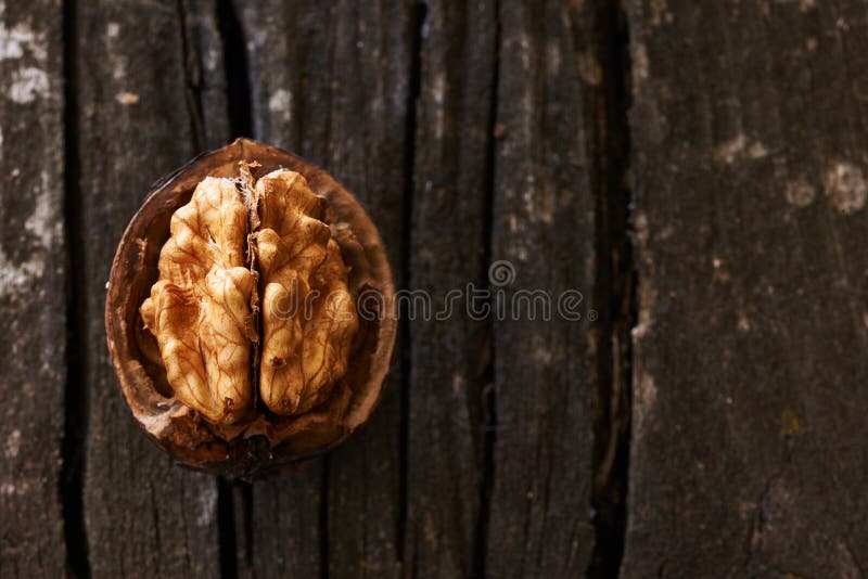 Open walnut on old wood stock photo. Image of fruit, group - 61045920