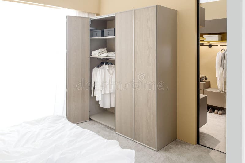 Open Wardrobe with Cloth in Bedroom Interior. Stock Image - Image of ...