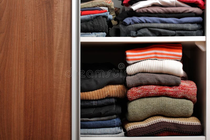 Open Wardrobe with Lots of Folded Clothes Stock Image - Image of pants ...