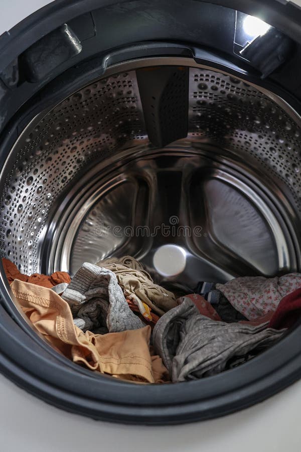 Open Washing Machine with Laundry Inside. Stock Image - Image of neat ...