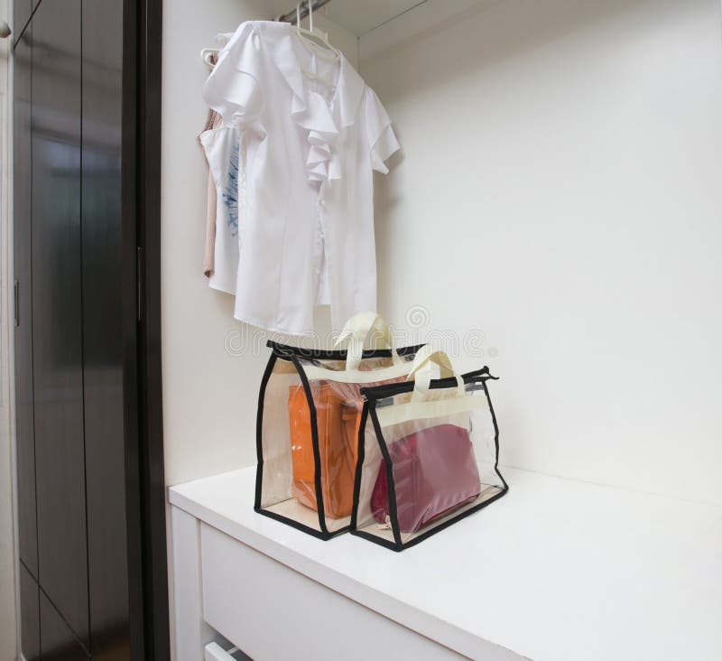 Opened Closet with Clothes and Bags and Empty Space Stock Image - Image ...