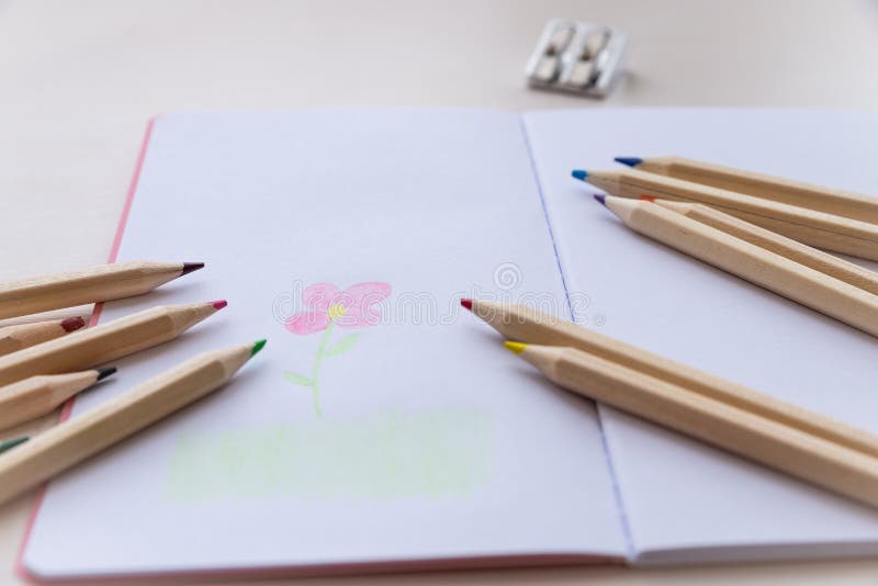 Open Notebook, with Colored Crayons and Drawing Stock Photo - Image of ...