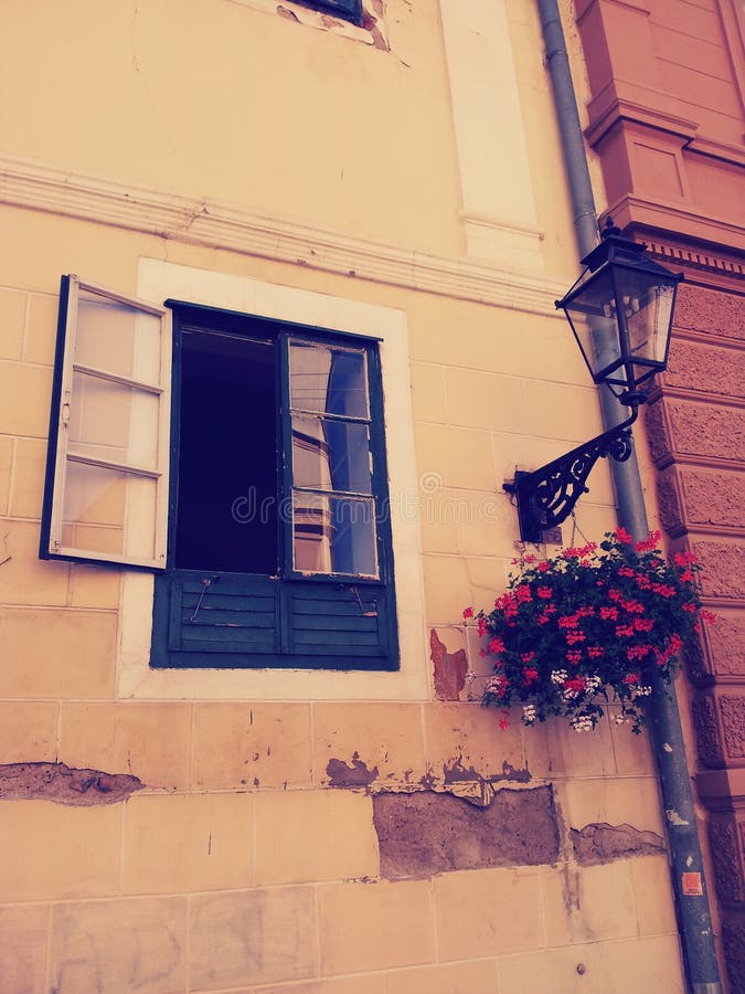 Open Window and Flowers Under Lantern Stock Image - Image of outdoor ...