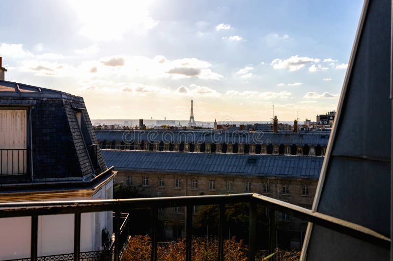 Open Window with View of Rooftops and Eiffel Tower in Paris, France ...
