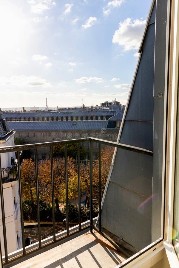 Open Window with View of Rooftops and Eiffel Tower in Paris, France ...