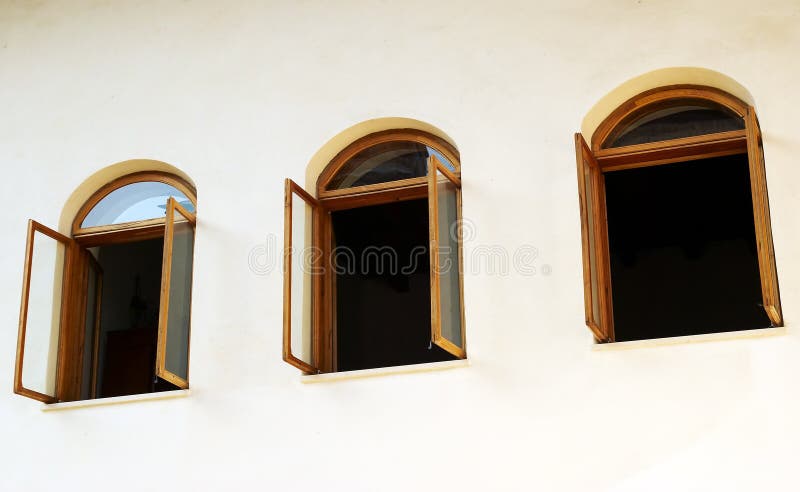 Open windows on white wall stock image. Image of opened - 11015005