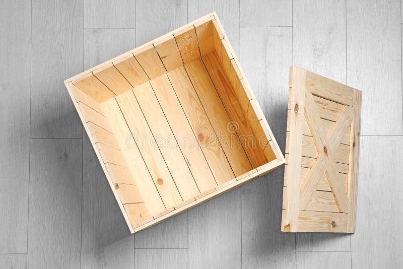 Open wooden crate on floor stock photo. Image of board - 155999372