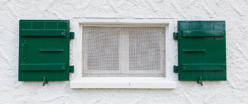 Open wooden green shutters stock photo. Image of exterior - 61388802
