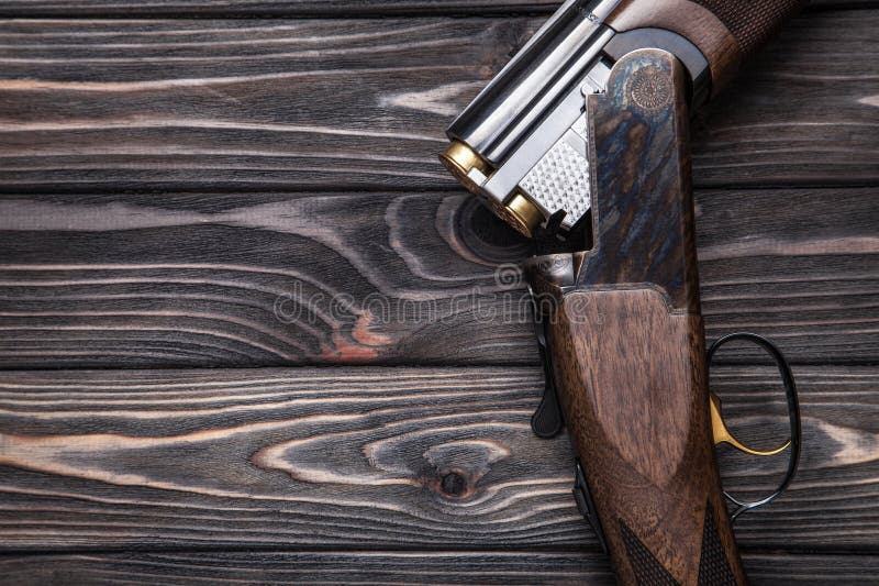 Open Hunting Rifle on a Wooden Background Stock Photo - Image of ...
