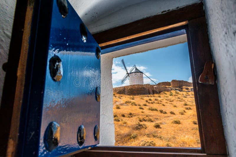 Open Wooden Window Overlooking a Windmill Stock Photo - Image of ...