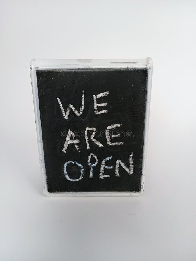 We are Open Written on a Chalkboard on a White Background Stock Image ...