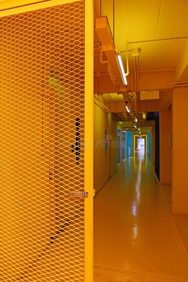 Open Yellow Grating Steel Door Stock Photo - Image of closeup, concrete ...