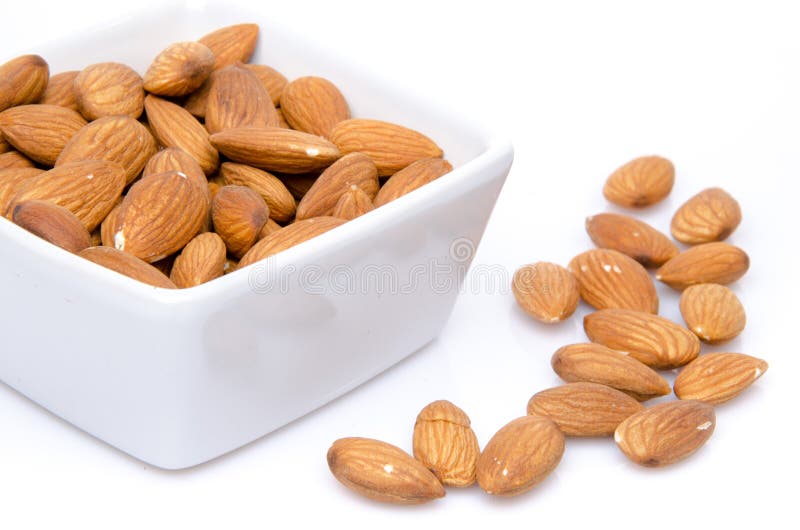 Opened almonds in a cup stock photo. Image of tasty, fresh - 42130720