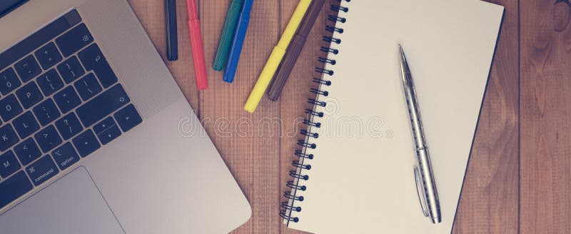Opened Blank Notebook, Laptop and Colored Felt-tip Pens on the Desktop ...