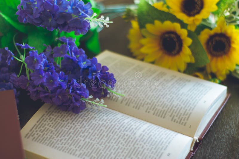 Opened Book with Flowers on a Wood Table. Stock Photo - Image of wooden ...