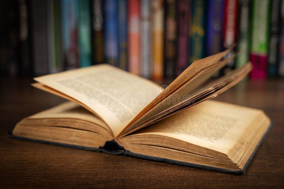 Opened Book, Lying on the Bookshelf in Library Stock Image - Image of ...