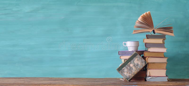 Opened Book on a Pile of Old Books and a Cup of Coffee,education ...