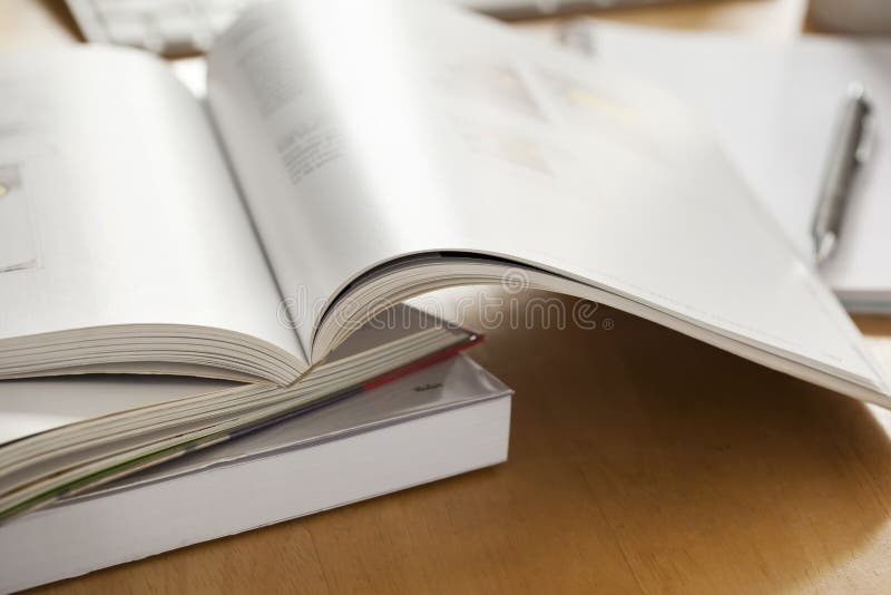 Opened book put on table stock image. Image of paper - 55234771
