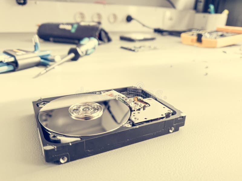 Opened Computer Hard Drive on a Table Prepared To Be Fixed. Stock Photo ...
