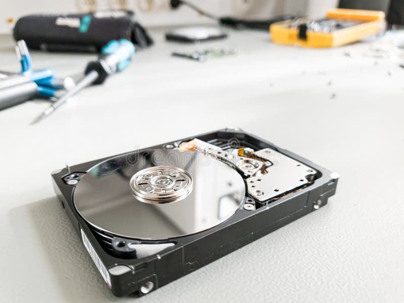 Opened Computer Hard Drive on a Table Prepared To Be Fixed. Stock Photo ...