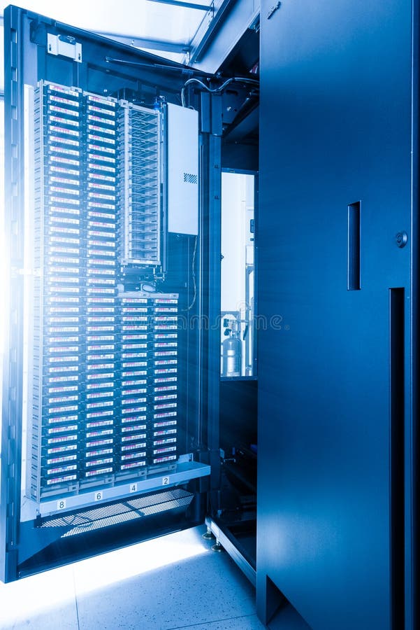 An Opened Door of Data Center Cabinet Filled with Data Storage H Stock ...