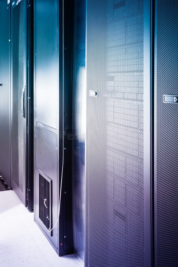 An Opened Door of Data Center Cabinet Filled with Data Storage H Stock ...