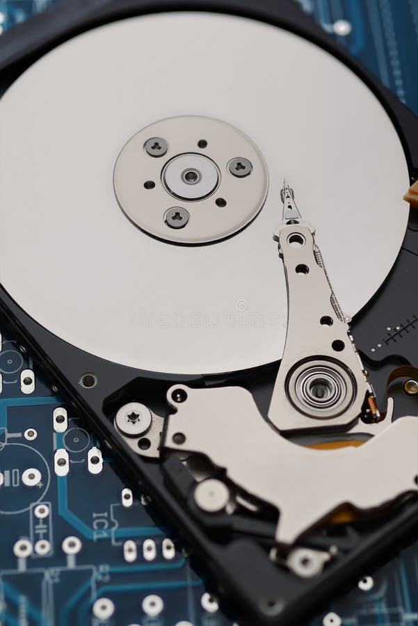 Opened hard disk drive stock image. Image of inside - 142786861