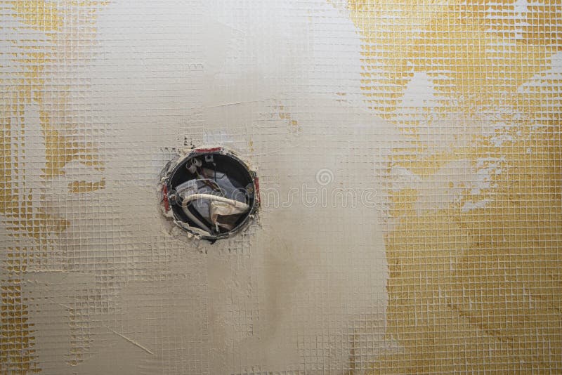 Opened Junction Box and Electrical Wire on Rough Wall with Yellow Paint ...