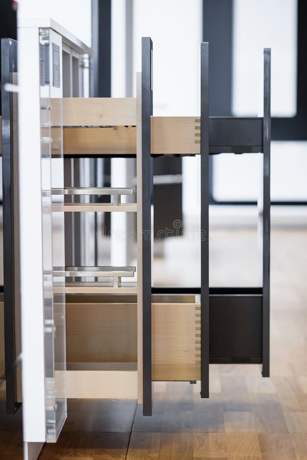 Opened Kitchen Drawer with Cutlery Tray. Two Drawers are Hide Behind ...