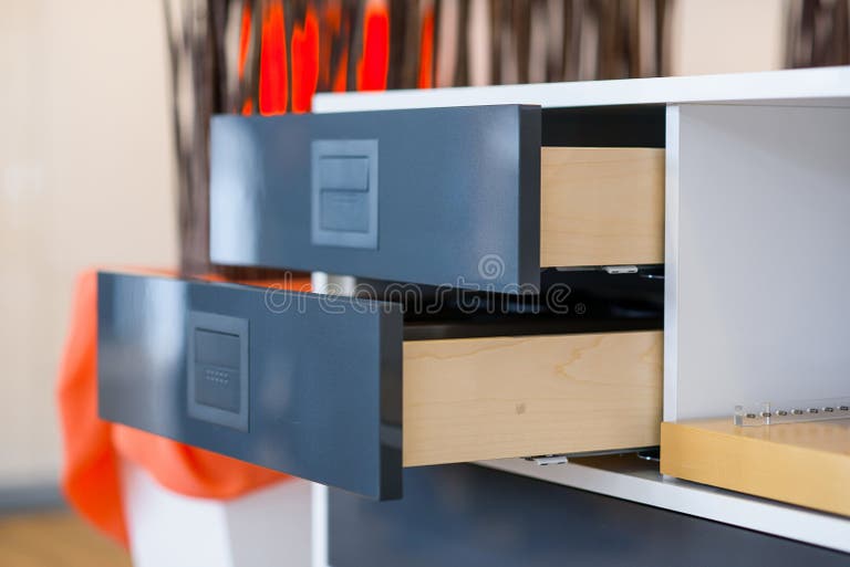 Opened Kitchen Drawer with Cutlery Tray. Two Drawers are Hide Behind ...