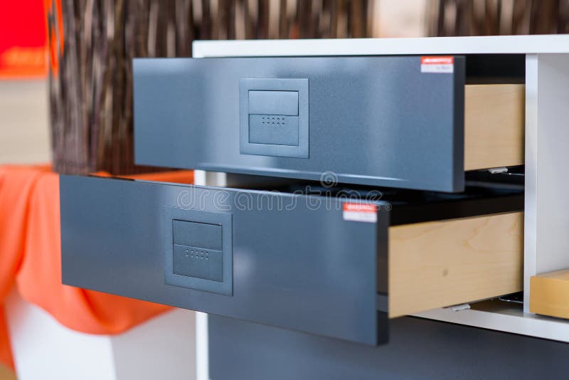 Opened Kitchen Drawer with Cutlery Tray. Two Drawers are Hide Behind ...