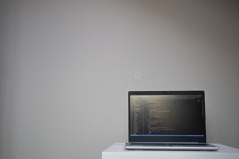 Opened Laptop with Code on the Screen on the Table Stock Image - Image ...